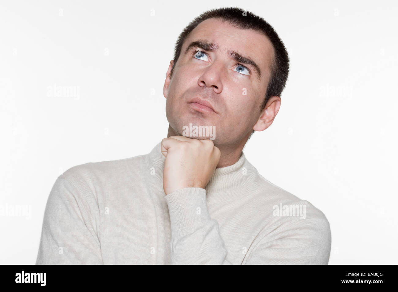 Portrait of an handsome expressive man in studio on white isolated ...
