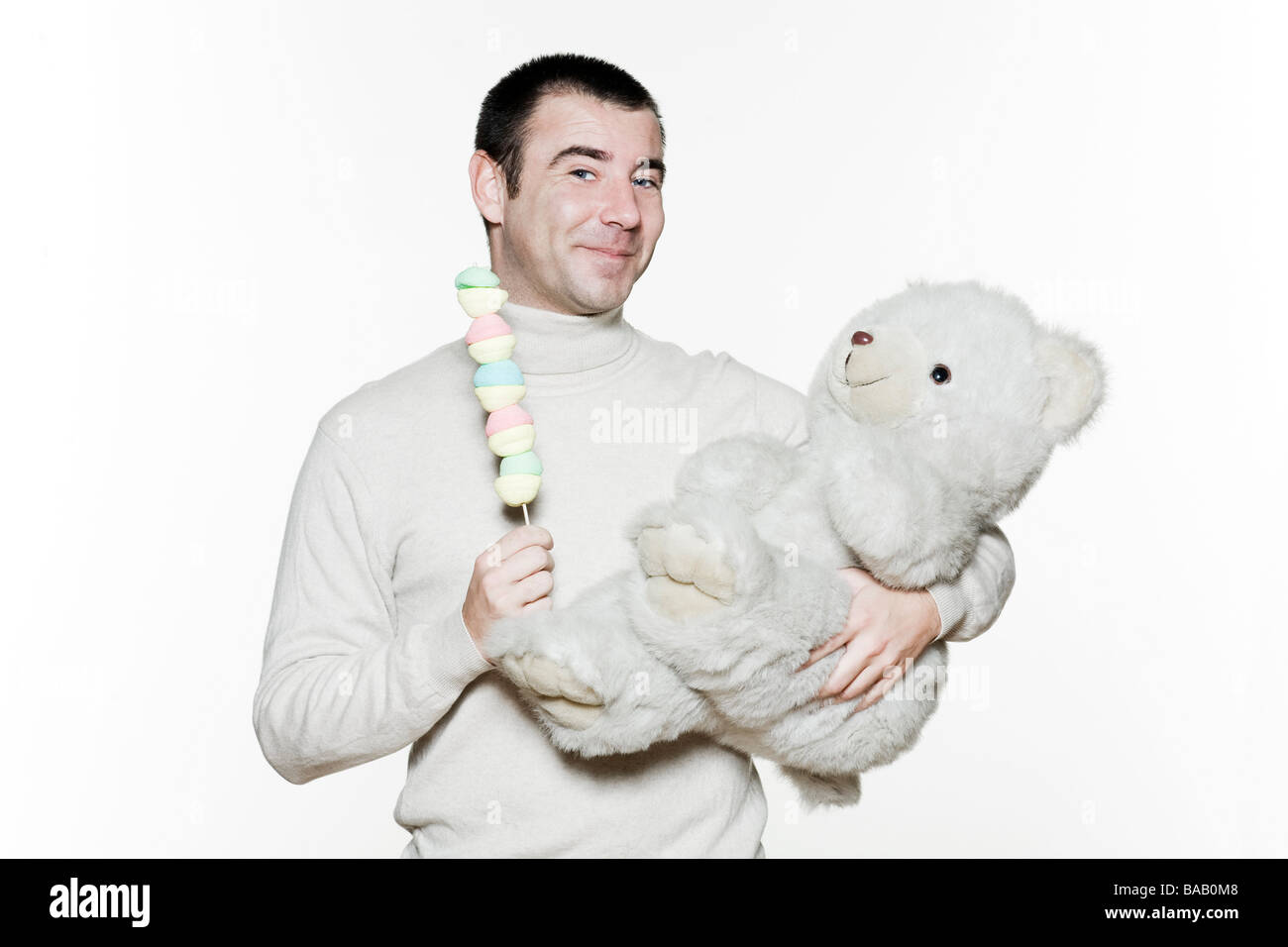 Portrait of an handsome expressive man in studio on white isolated ...