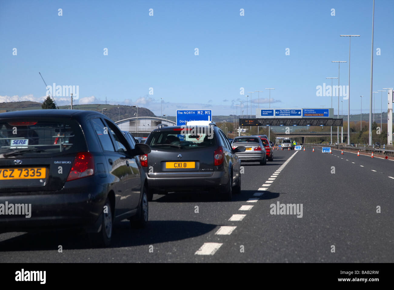 police closing the M2 motorway in northern ireland just outside Belfast ...