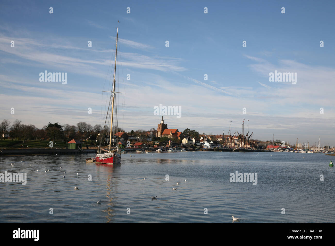 The Telegraph moored on the river Blackwater in Essex at high tide with ...