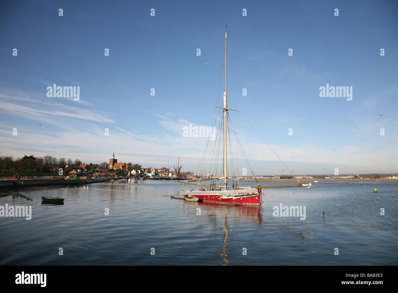 The Telegraph moored on the river Blackwater in Essex at high tide with ...