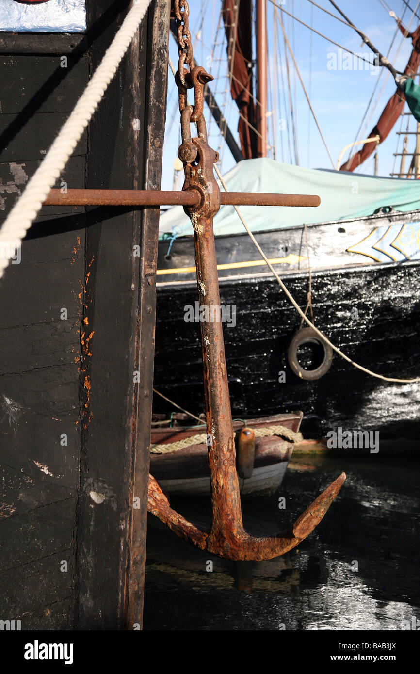 An anchor on a Thames sailing barge moored at Maldon Essex Stock Photo ...