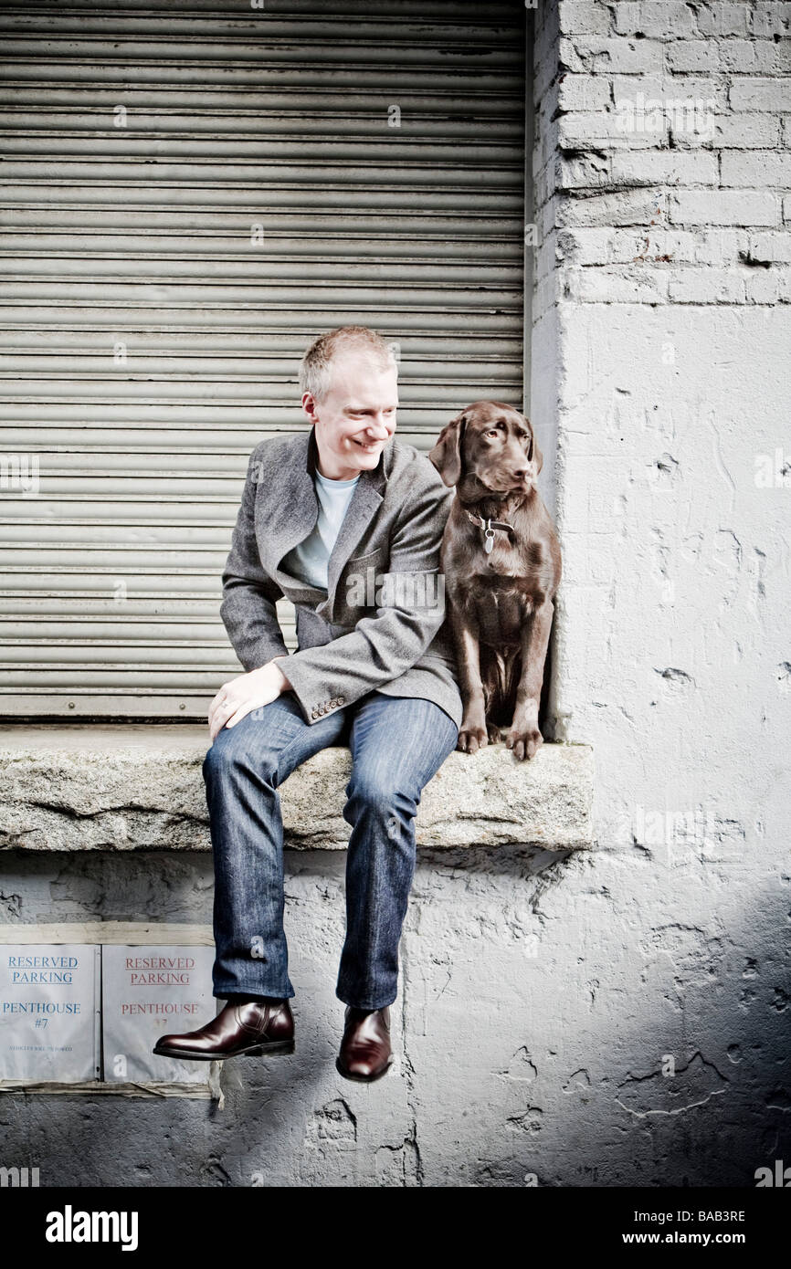 Man and dog Stock Photo - Alamy