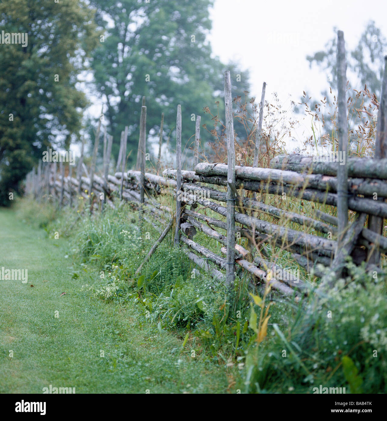 An Old Fence On The Countryside Sweden Stock Photo - Alamy