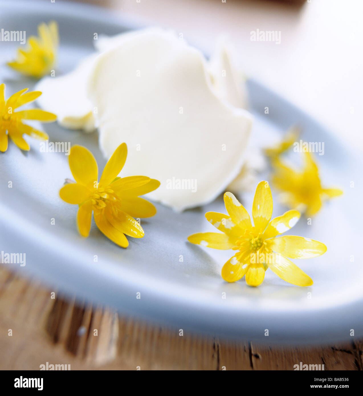 A Dessert Decorated With Yellow Flowers Stock Photo - Alamy