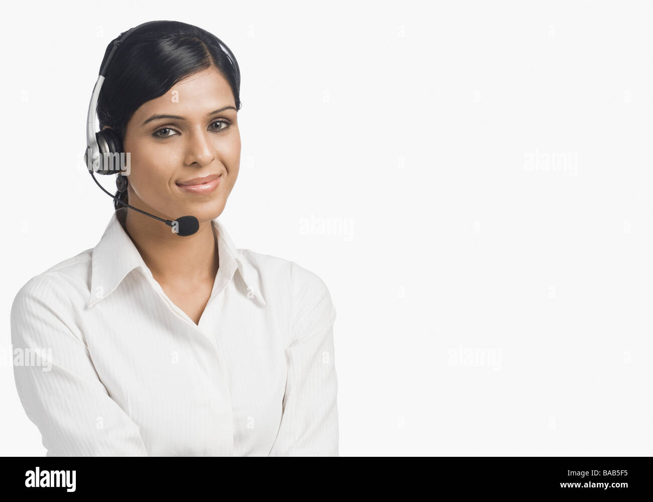 Portrait of a female customer service representative smiling Stock ...