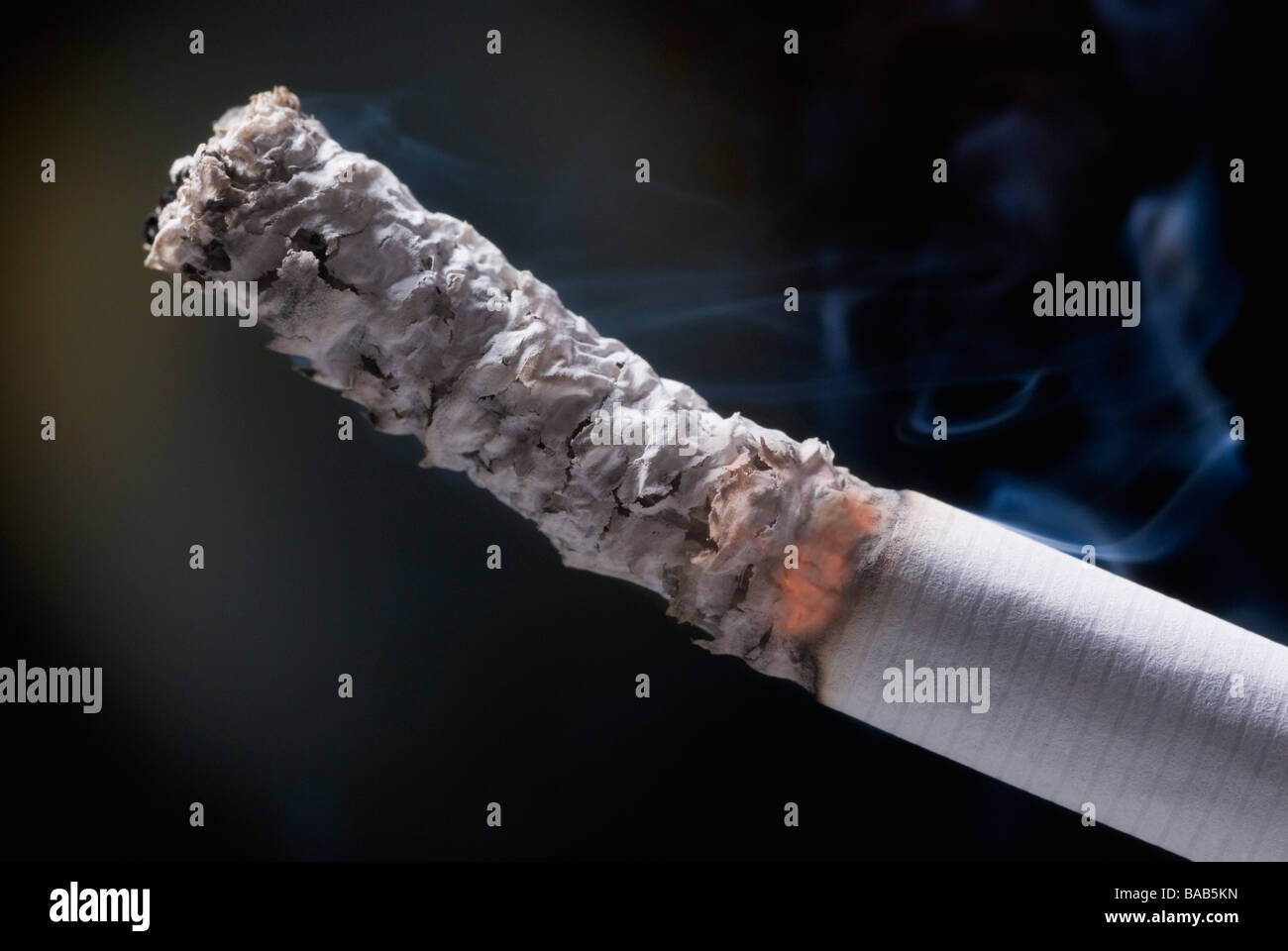 Close-up of a cigarette with ash Stock Photo - Alamy
