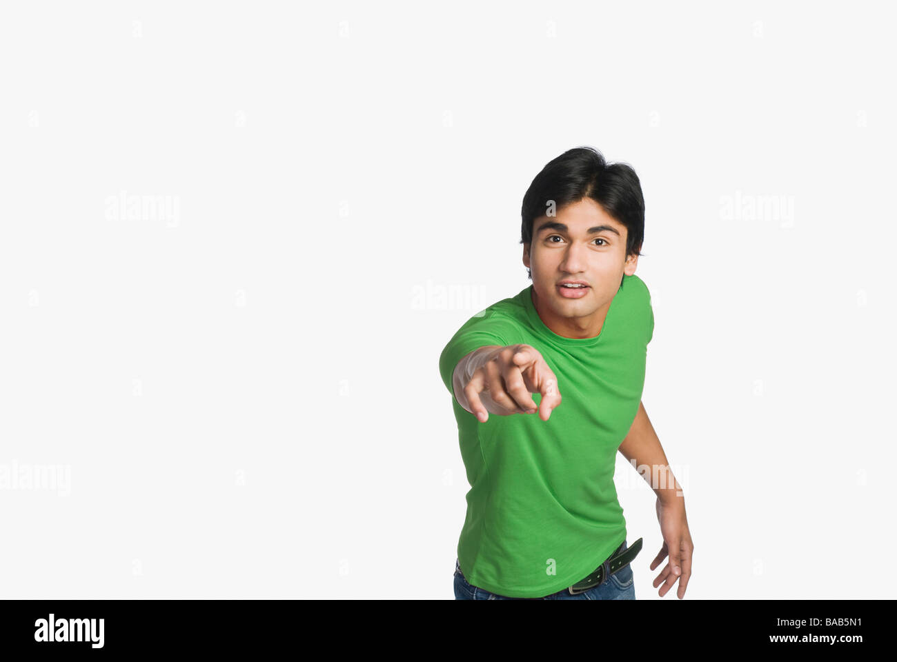 Portrait of a man pointing forward Stock Photo - Alamy