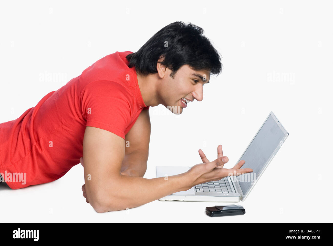 Working online on laptop Cut Out Stock Images & Pictures - Alamy
