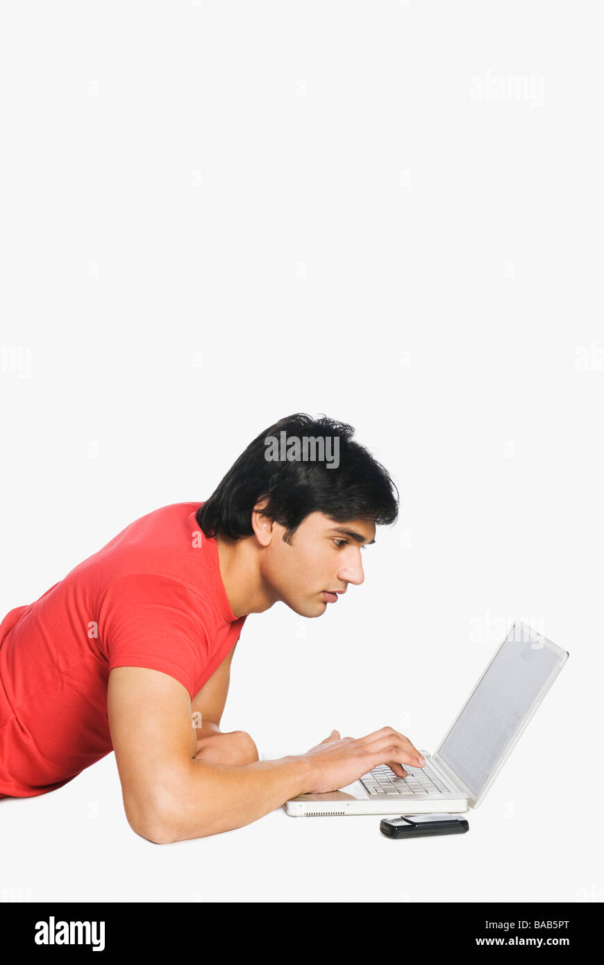 Working online on laptop Cut Out Stock Images & Pictures - Alamy