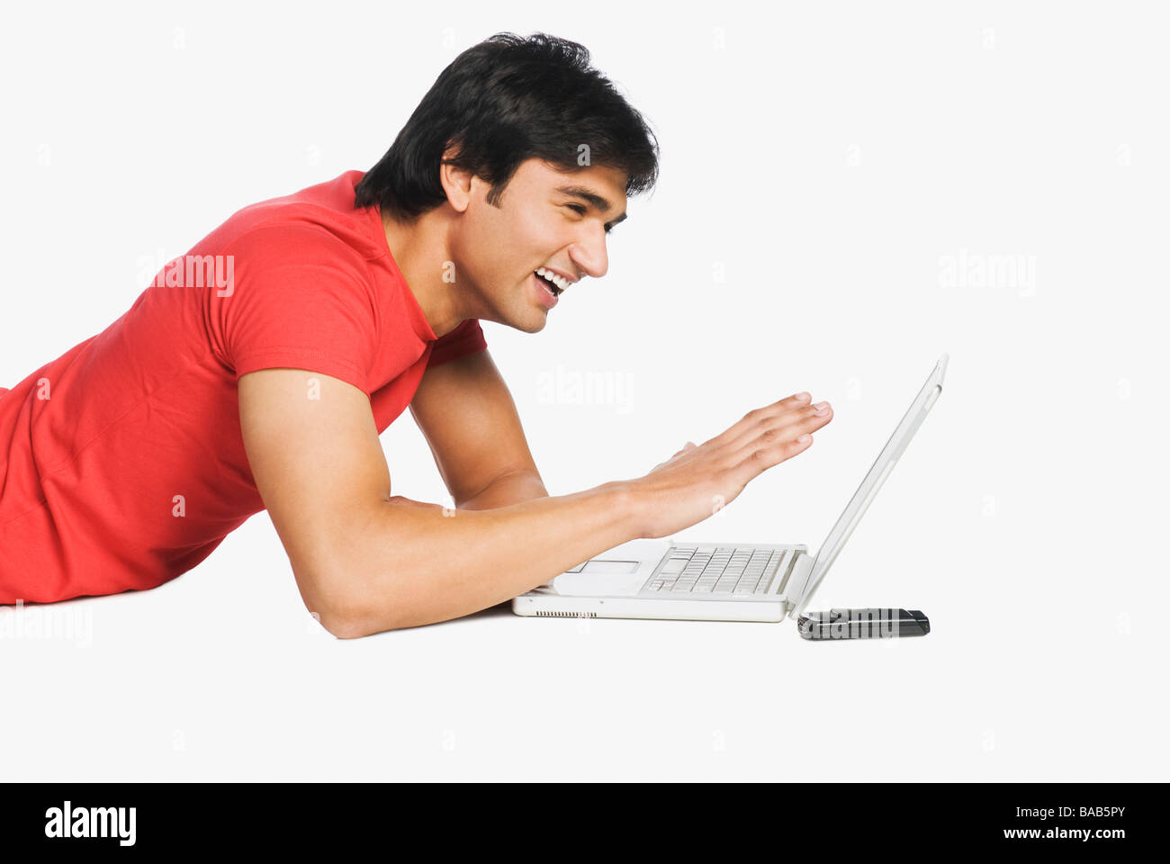 Man working on a laptop Stock Photo - Alamy