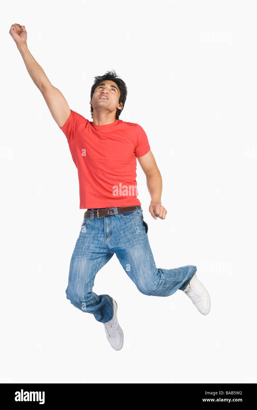 Man jumping in mid-air Stock Photo - Alamy