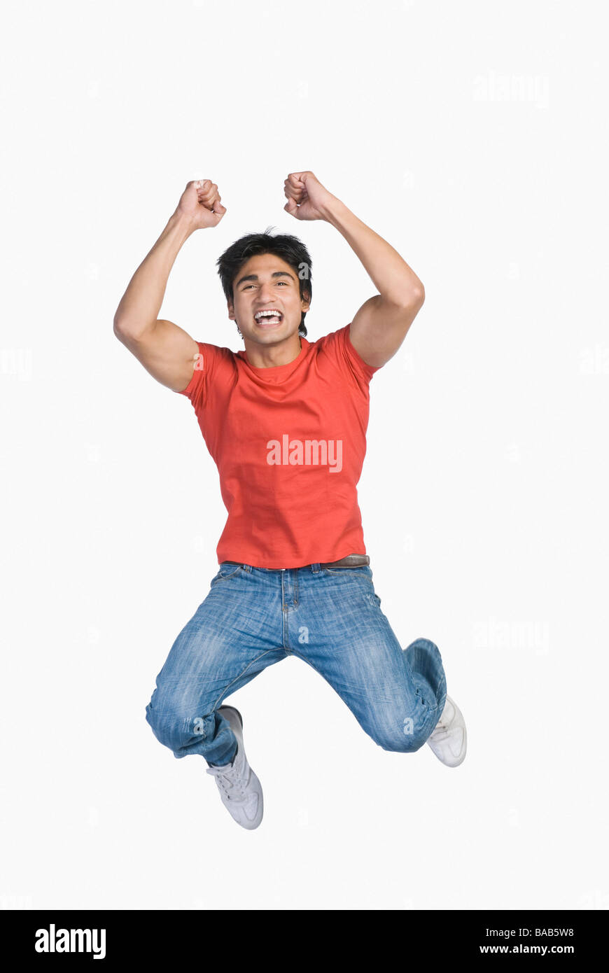Man jumping in mid-air Stock Photo - Alamy