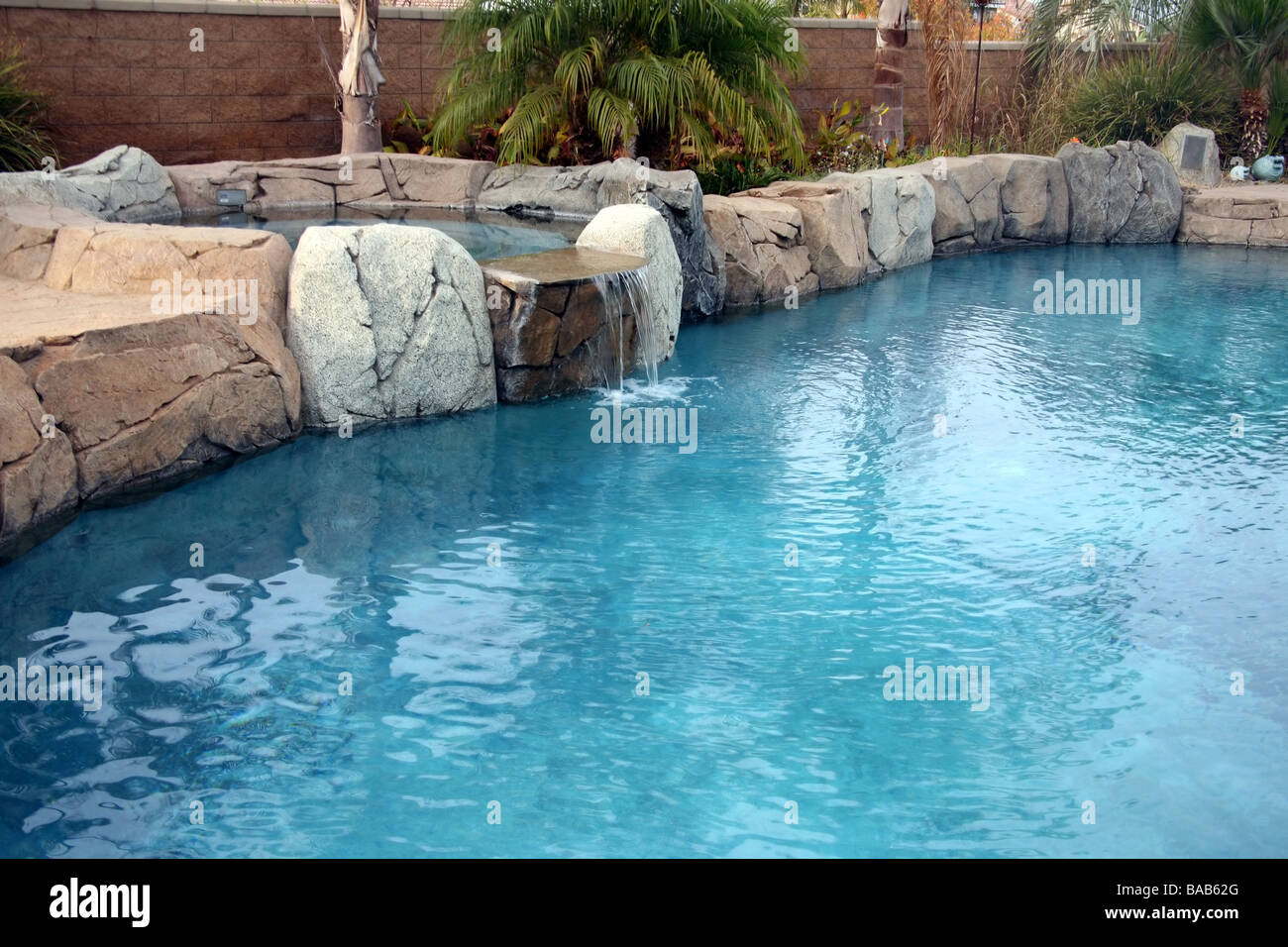 Beautiful and refreshing landscaped rock pool with a waterfall Stock ...
