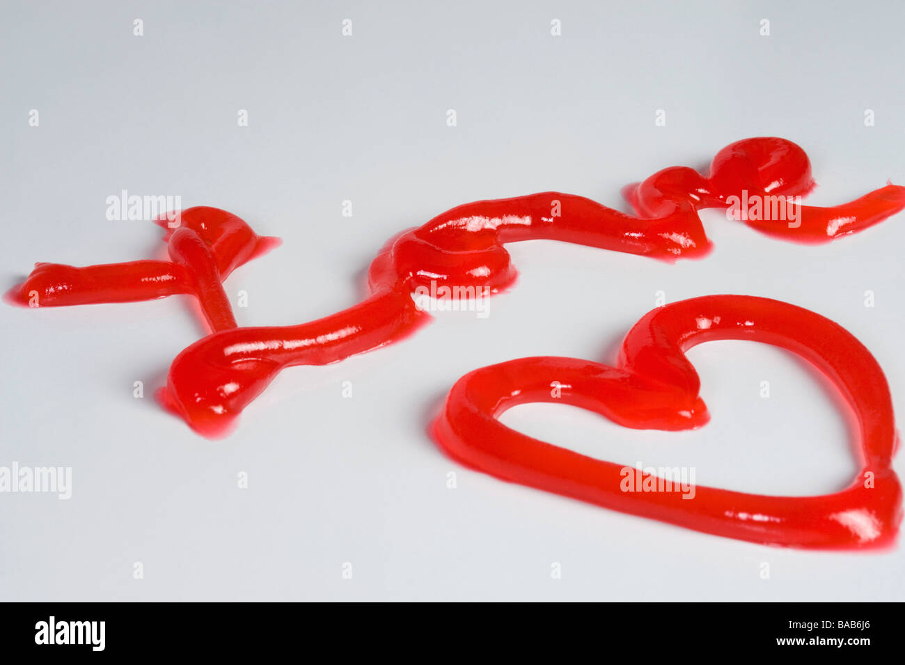 Word Love and heart shaped made from jam Stock Photo - Alamy