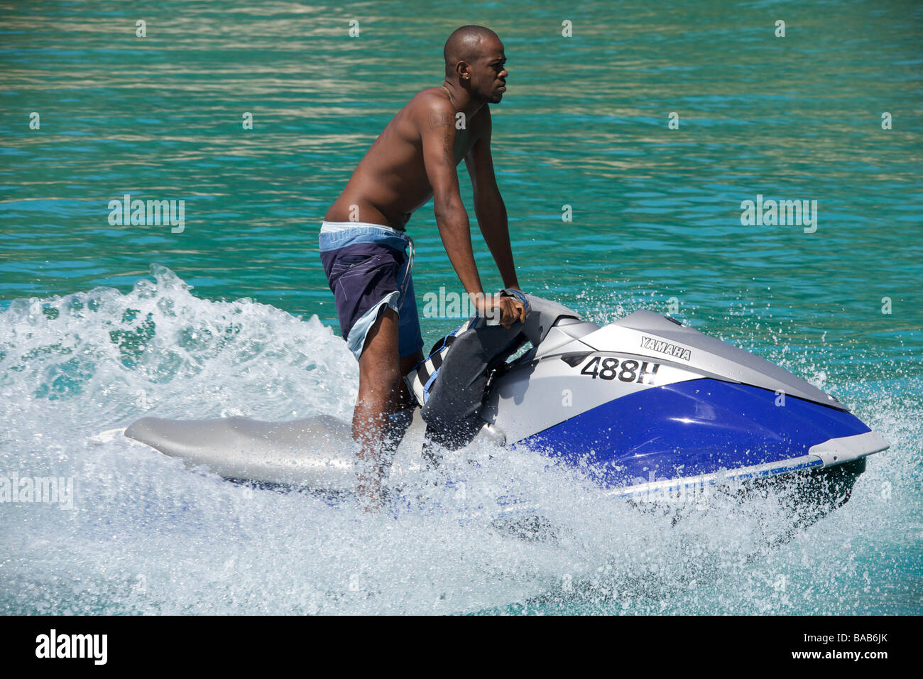 Local Bajan man riding on a "Jet Ski" or Personal Water Craft (PWC ...