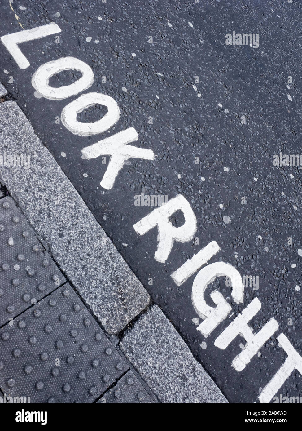 A Warning Text On The Street Stock Photo - Alamy
