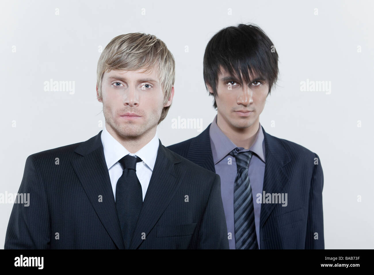 two male expressive young men on isolated background Stock Photo - Alamy