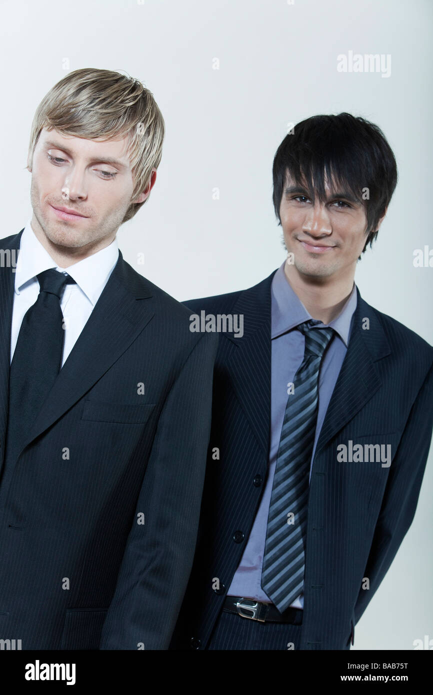 two male expressive young men on isolated background Stock Photo - Alamy