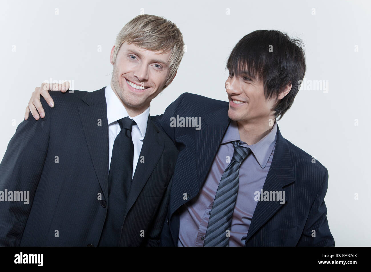 two male expressive young men on isolated background Stock Photo - Alamy