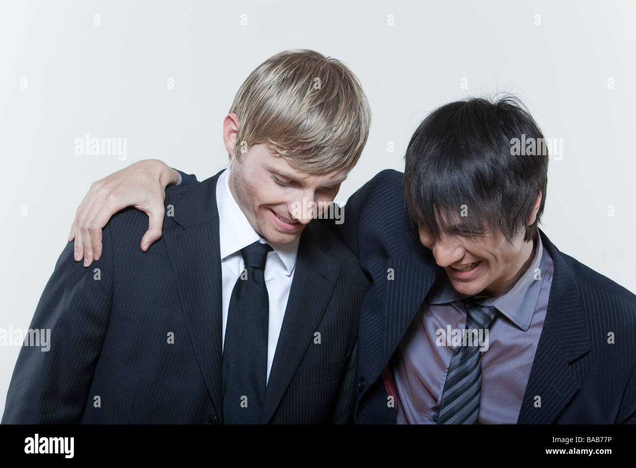 two male expressive young men on isolated background Stock Photo - Alamy