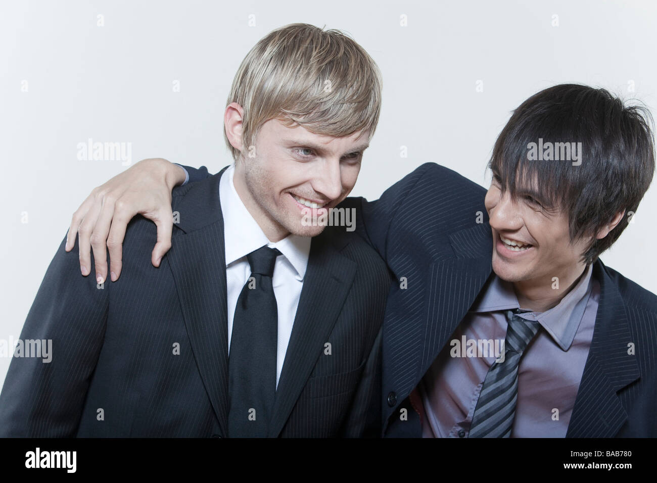 two male expressive young men on isolated background Stock Photo - Alamy