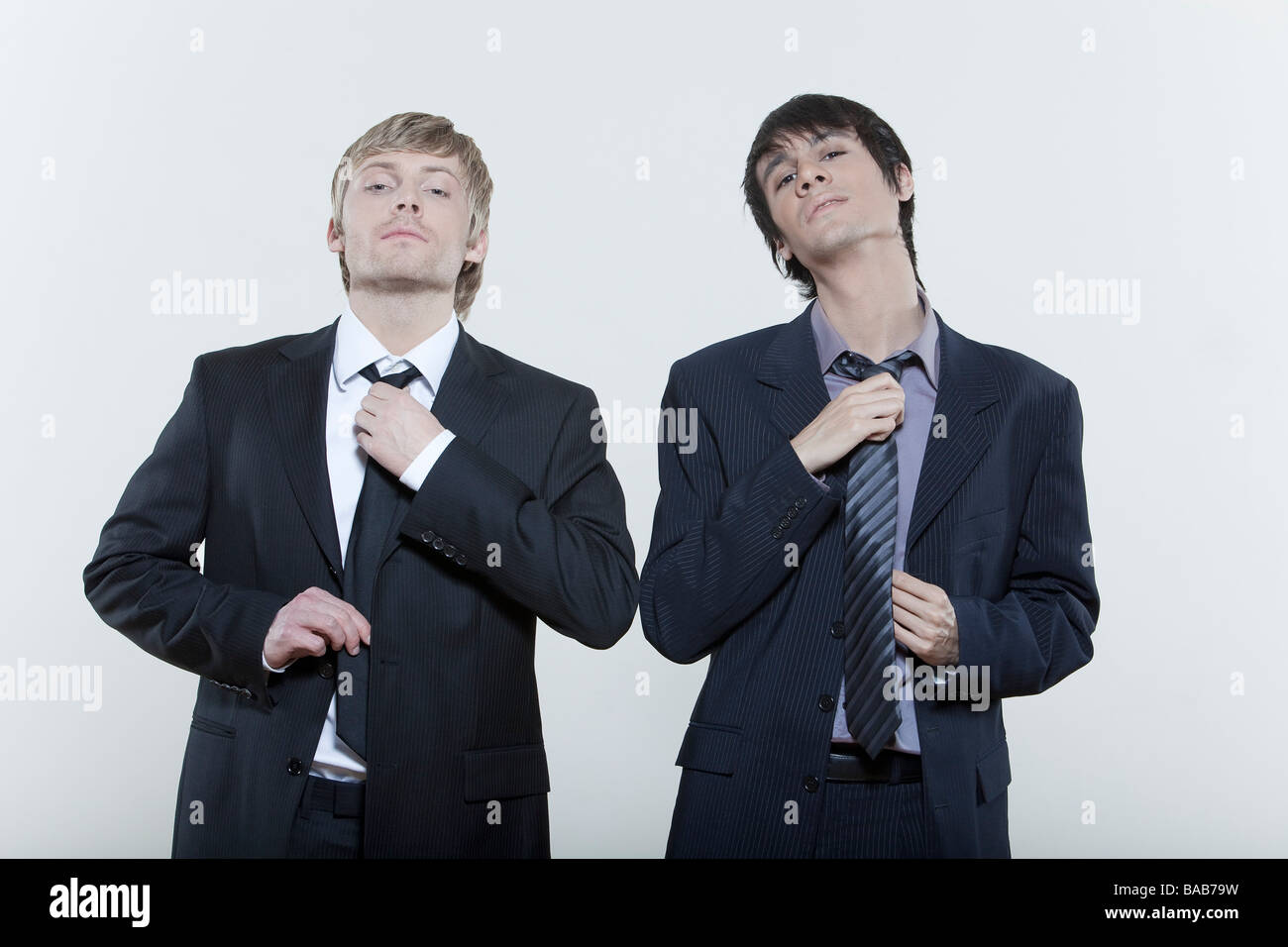 two male expressive young men on isolated background Stock Photo - Alamy
