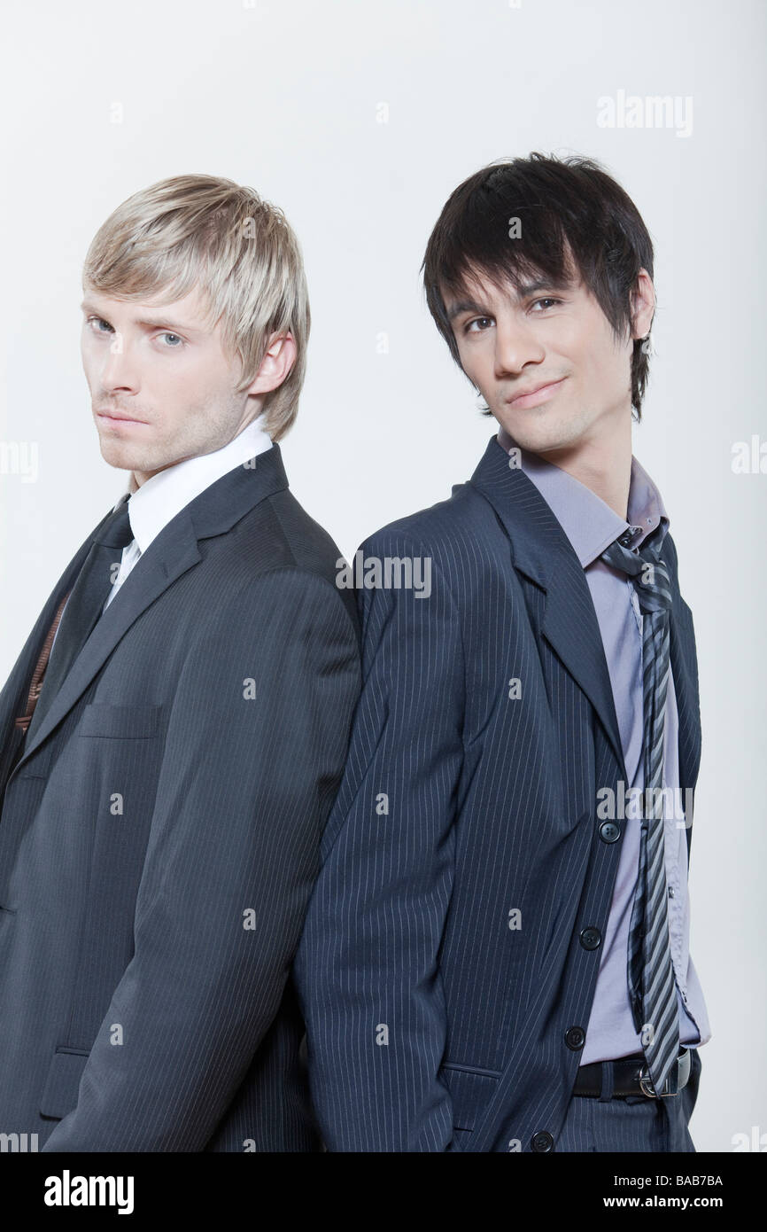 two male expressive young men on isolated background Stock Photo - Alamy