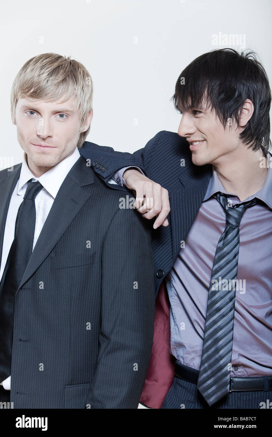 two male expressive young men on isolated background Stock Photo - Alamy