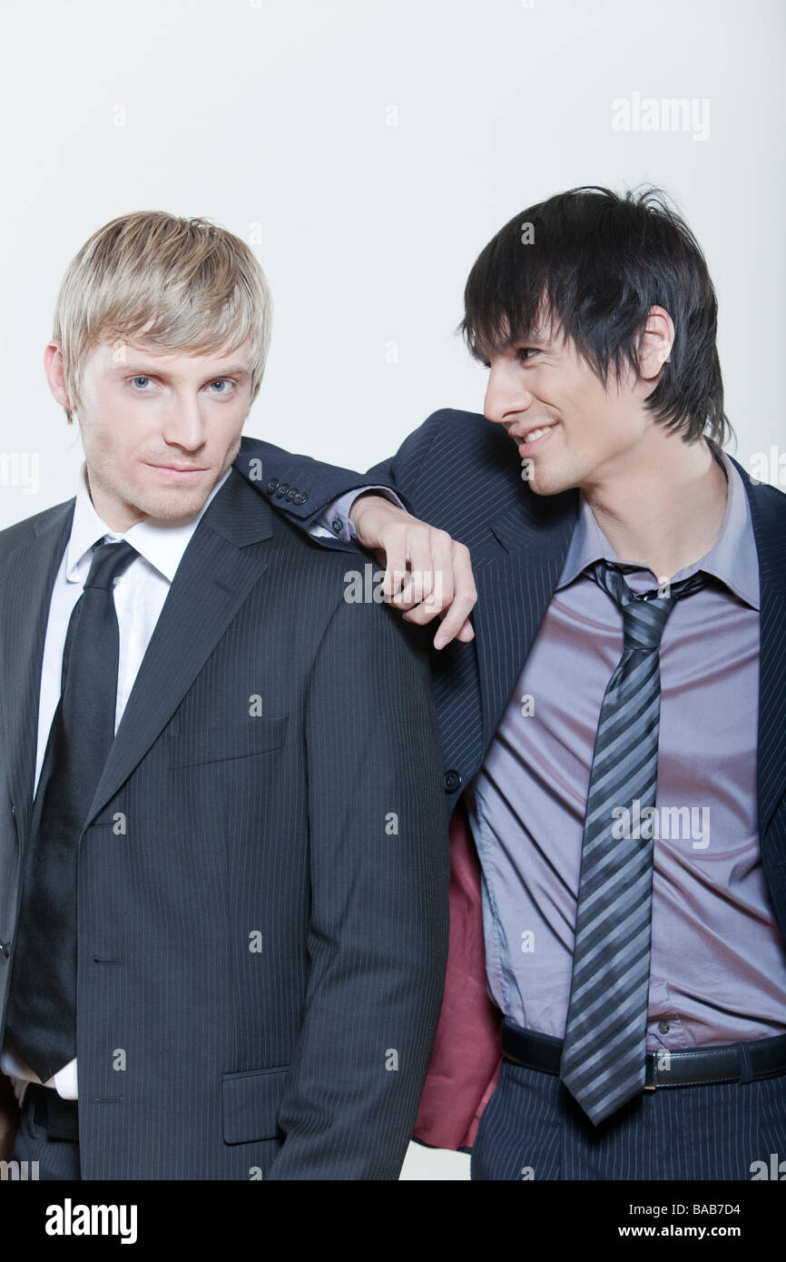 two male expressive young men on isolated background Stock Photo - Alamy