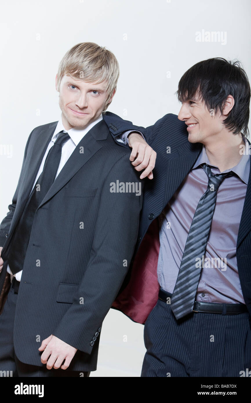 two male expressive young men on isolated background Stock Photo - Alamy