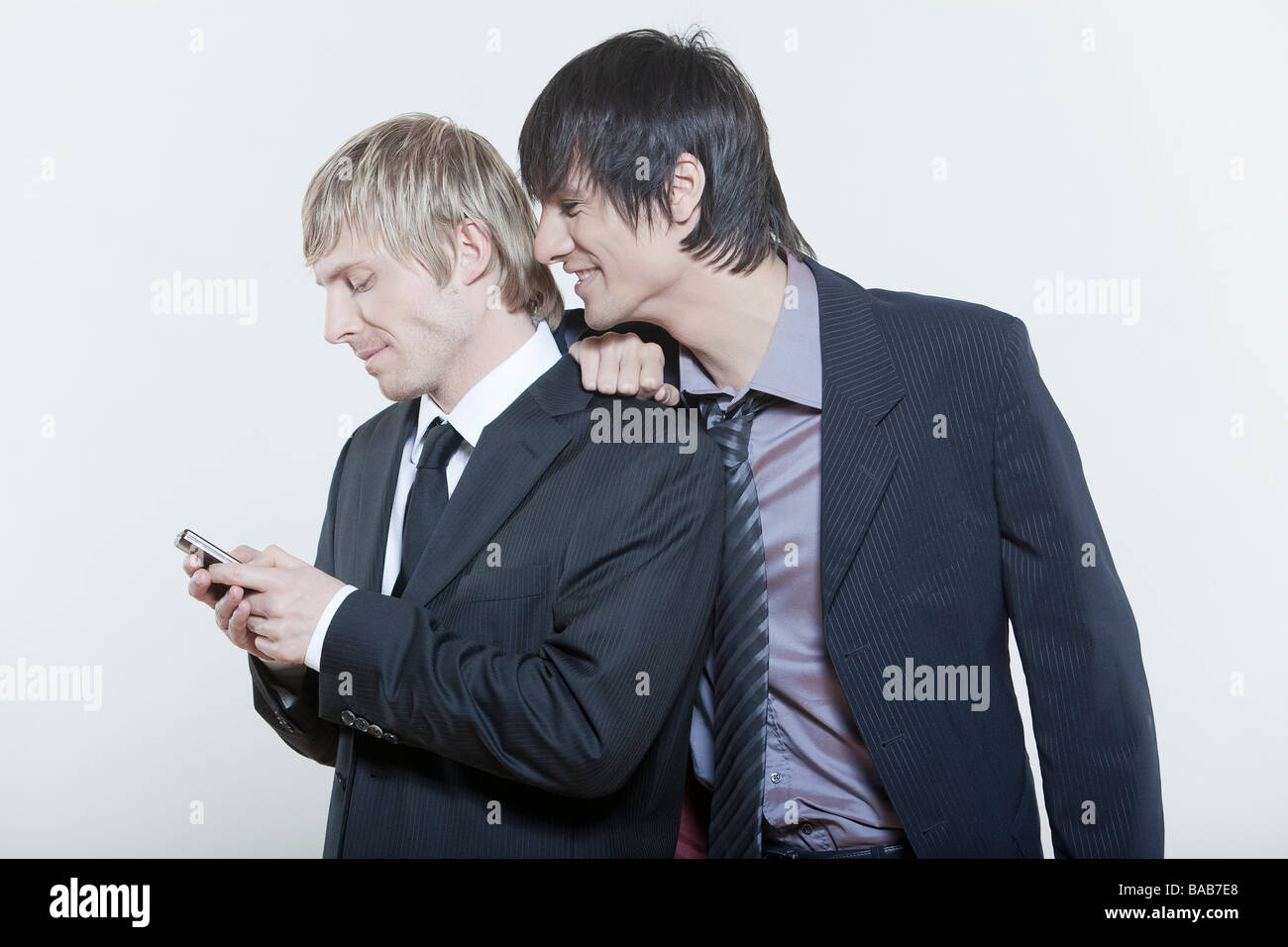 two male expressive young men on isolated background Stock Photo - Alamy
