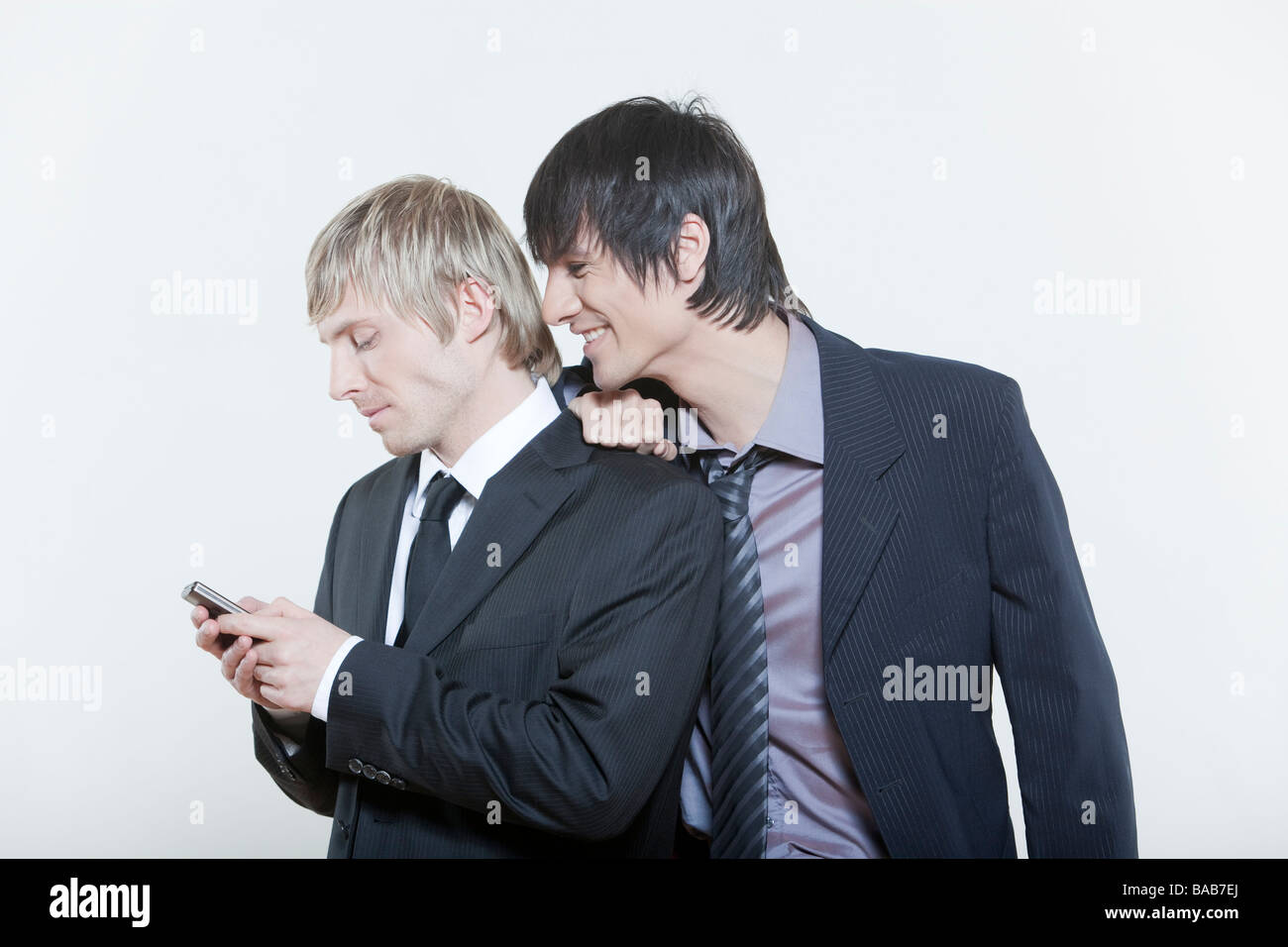 two male expressive young men on isolated background Stock Photo - Alamy