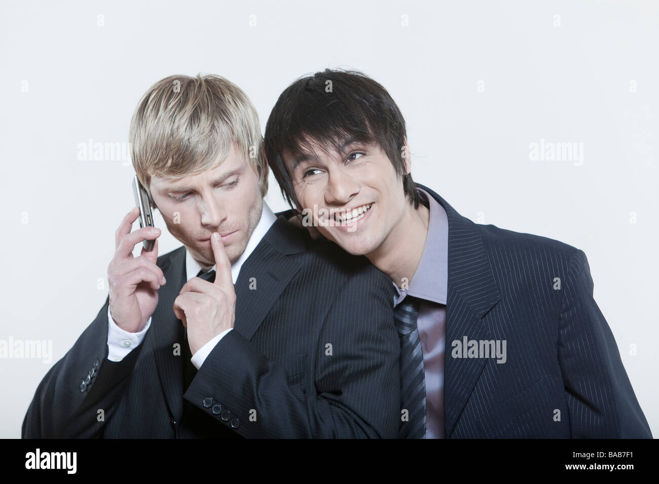two male expressive young men on isolated background Stock Photo - Alamy