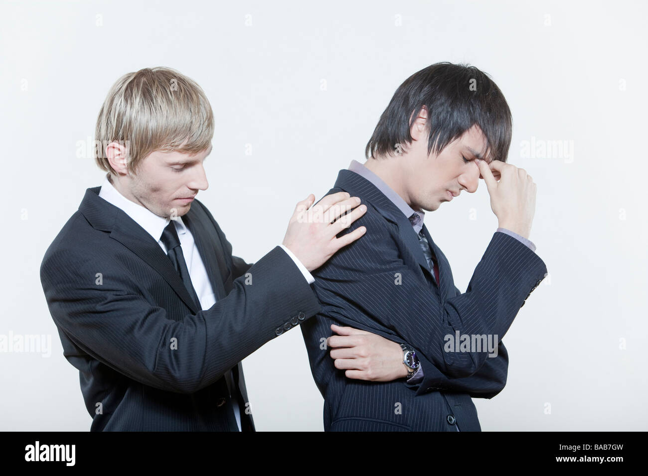 two male expressive young men on isolated background Stock Photo - Alamy