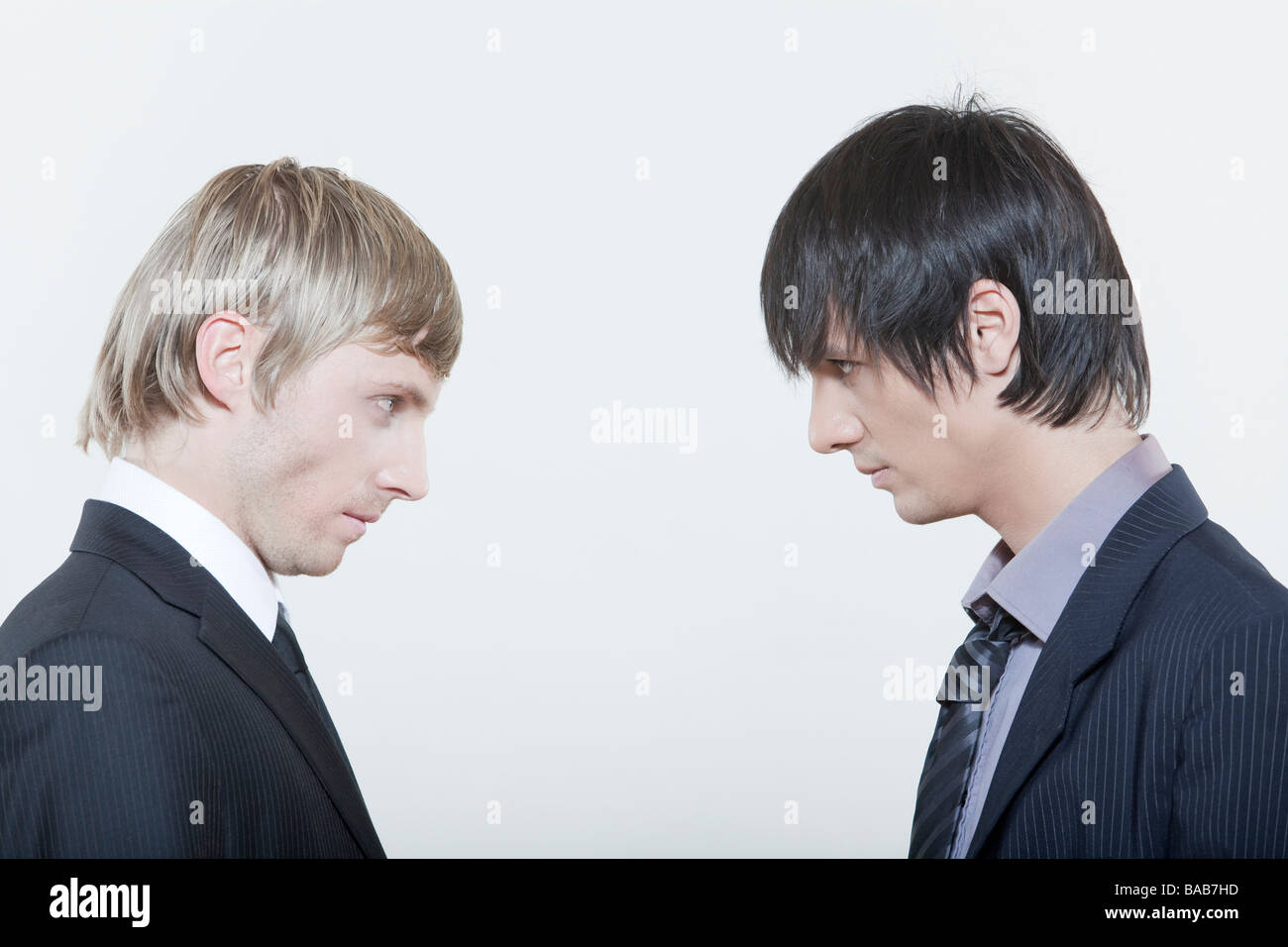 two male expressive young men on isolated background Stock Photo - Alamy