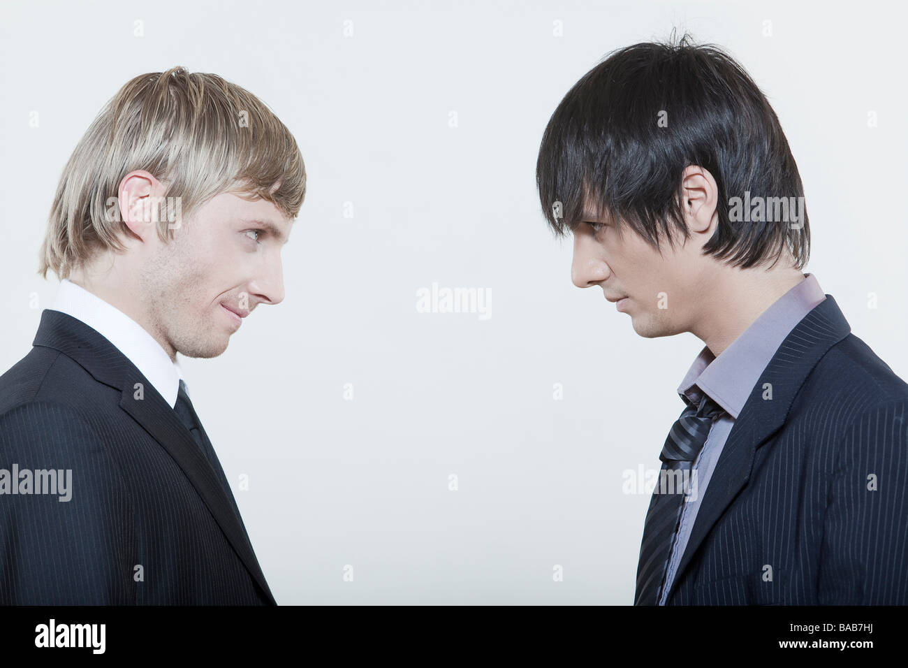 two male expressive young men on isolated background Stock Photo - Alamy