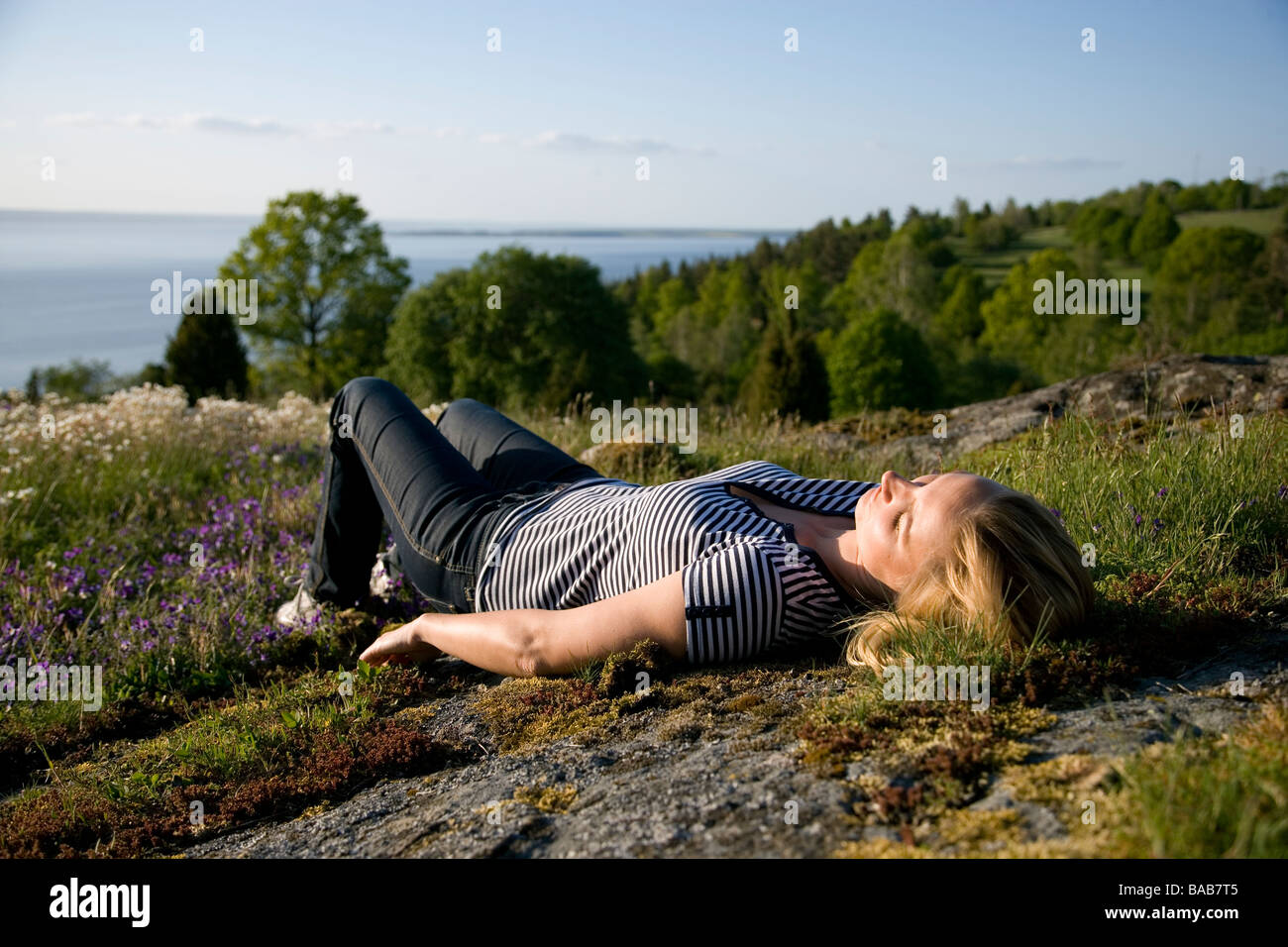 A woman resting Sweden Stock Photo - Alamy