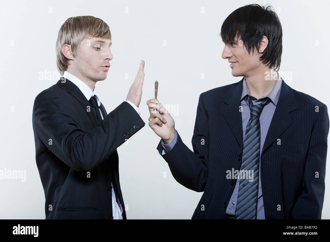 two male expressive young men on isolated background Stock Photo - Alamy