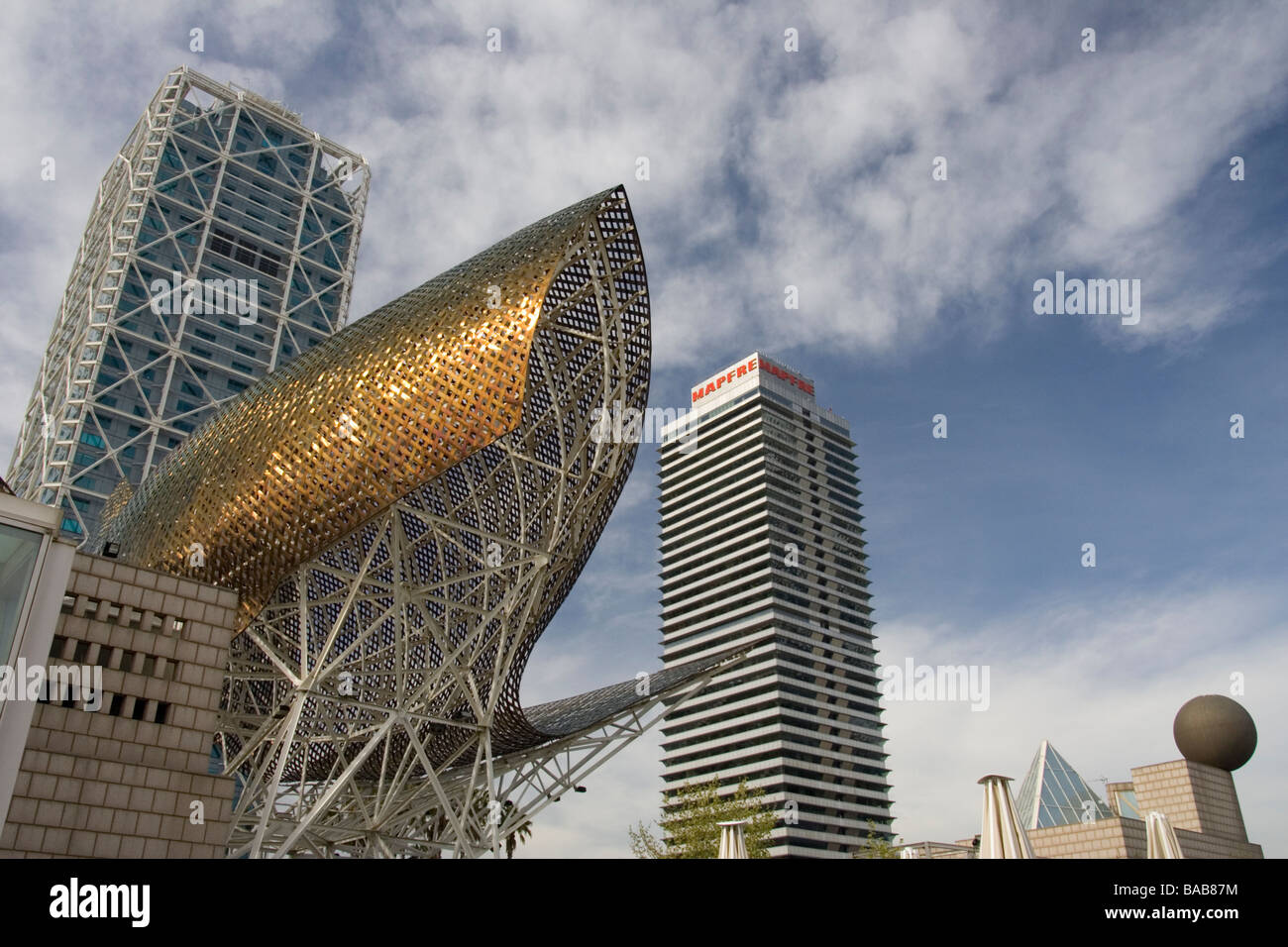 Metal sculpture and office block Stock Photo - Alamy