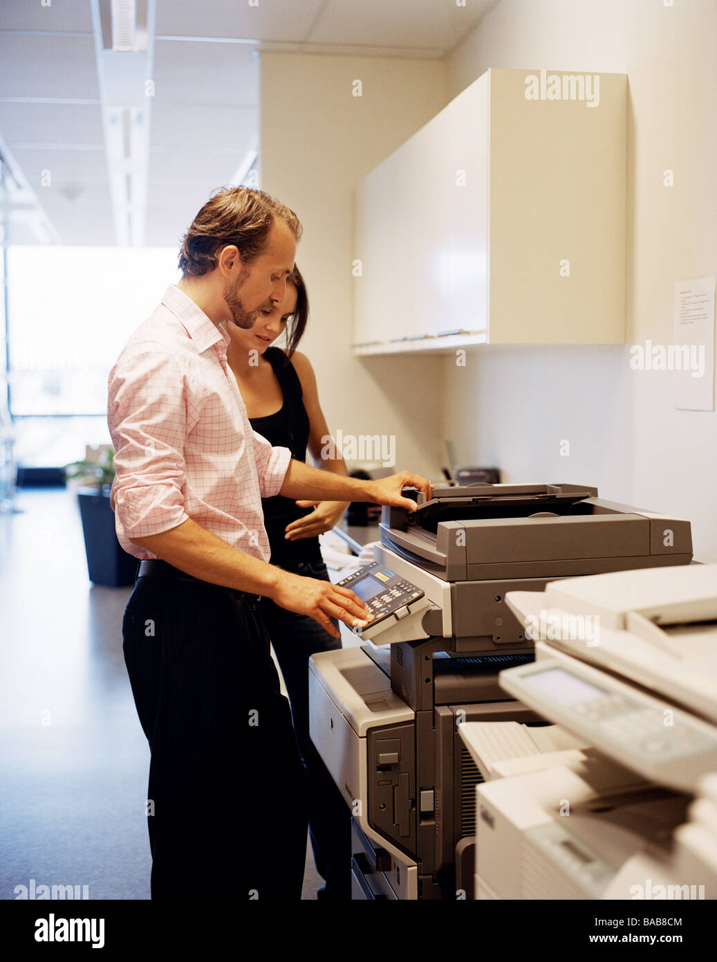 Man woman copier office hi-res stock photography and images - Alamy