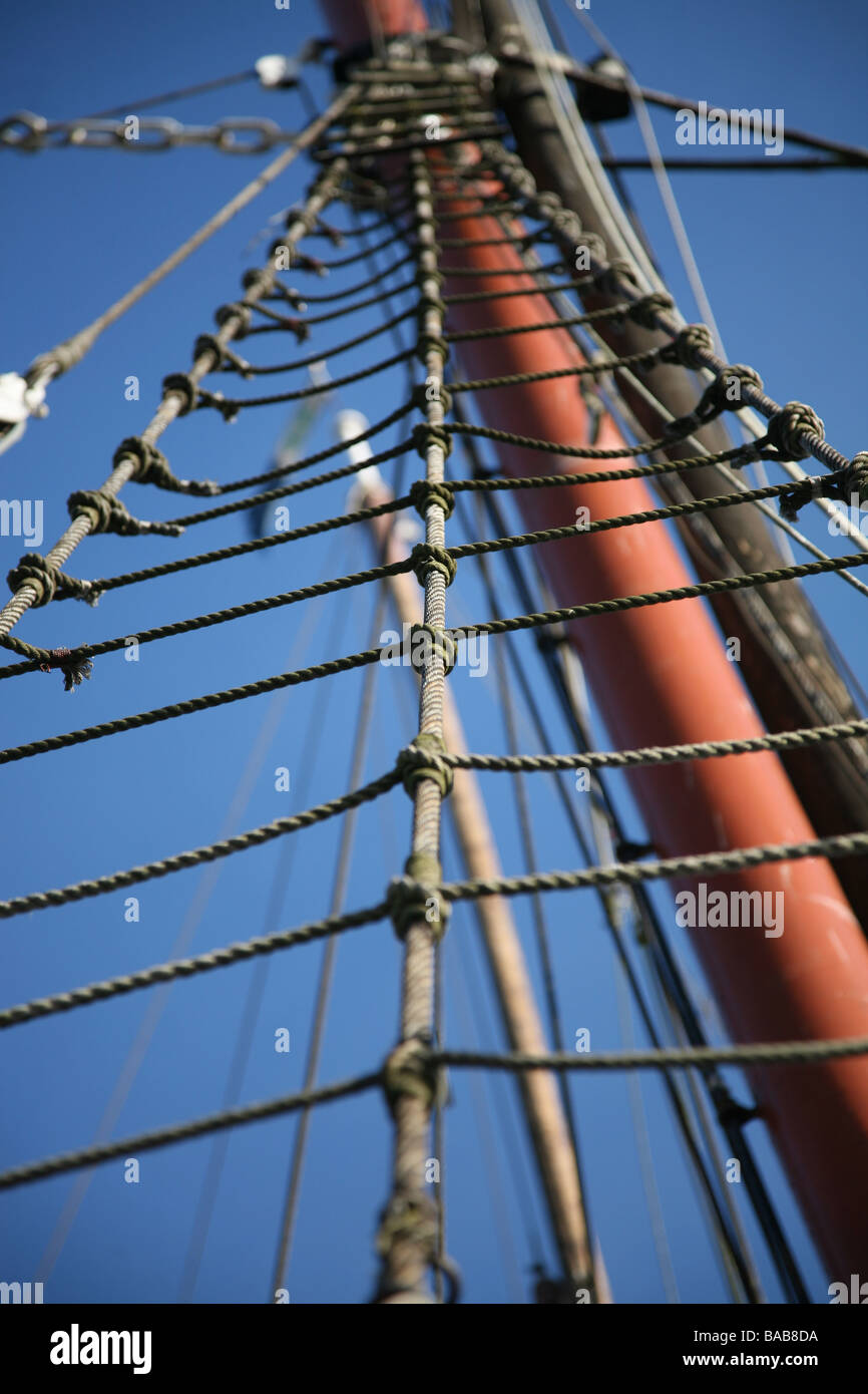 Rigging on the mast of a Thames sailing barge moored at Hythe Quay in ...