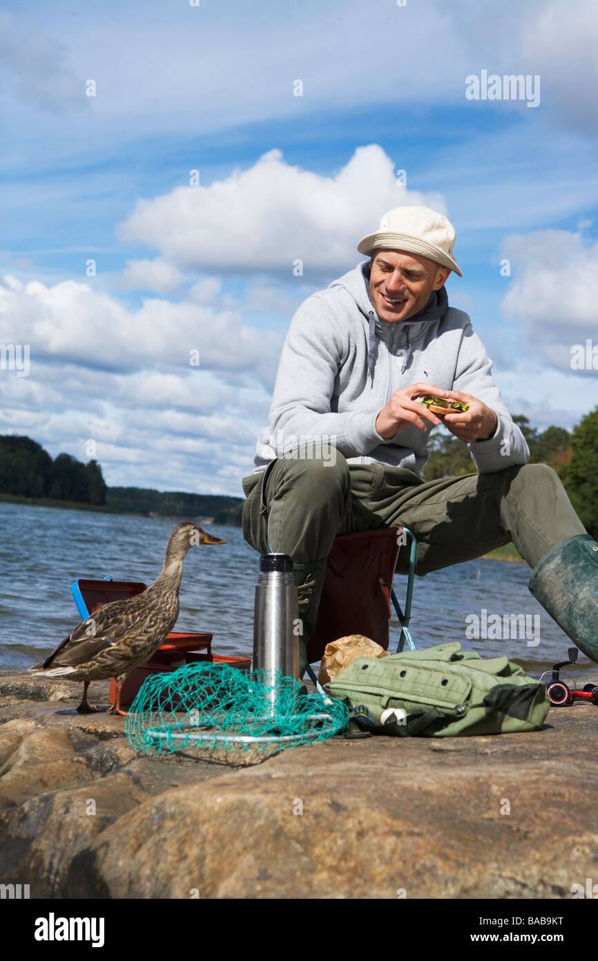 Man eating birds hi-res stock photography and images - Alamy