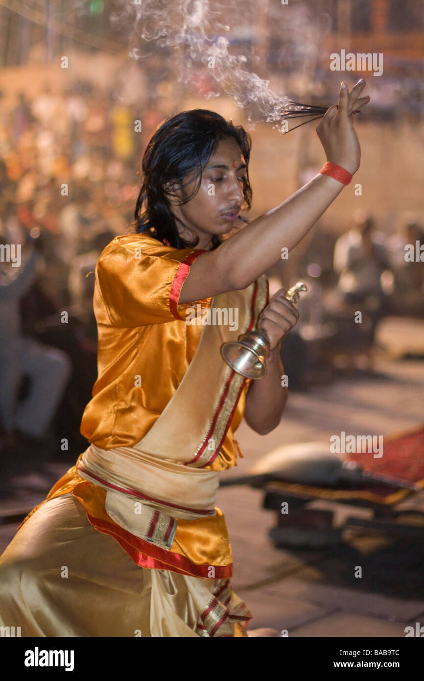 Young Hindu Priest at the Ganga Aarti in Varanasi, India Stock Photo ...