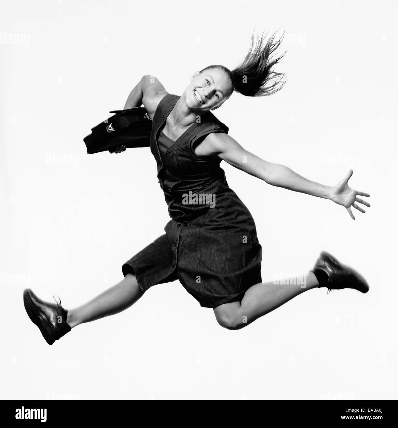 Jumping lady Black and White Stock Photos & Images - Alamy
