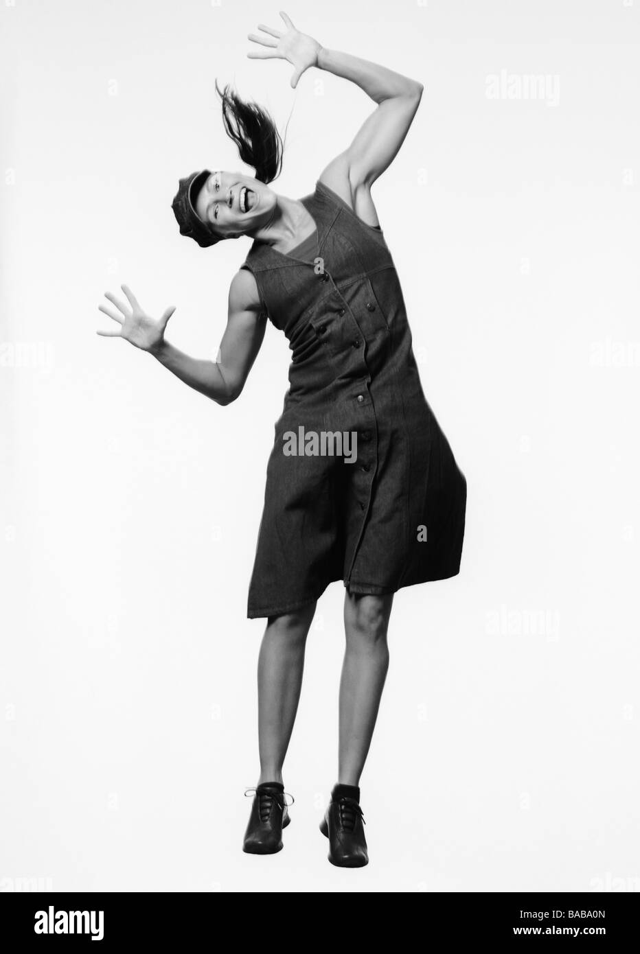 Jumping lady Black and White Stock Photos & Images - Alamy