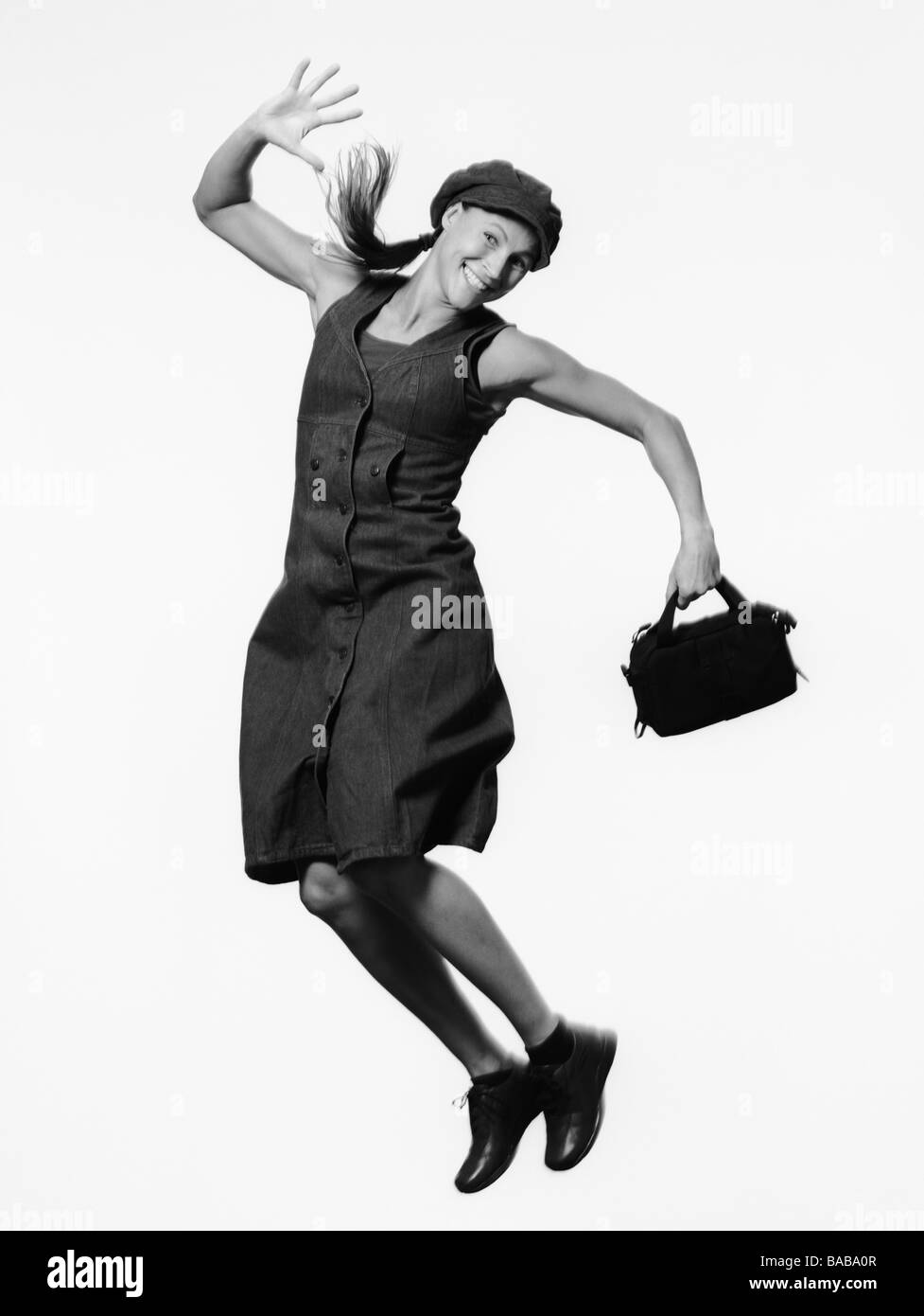 Jumping lady Black and White Stock Photos & Images - Alamy