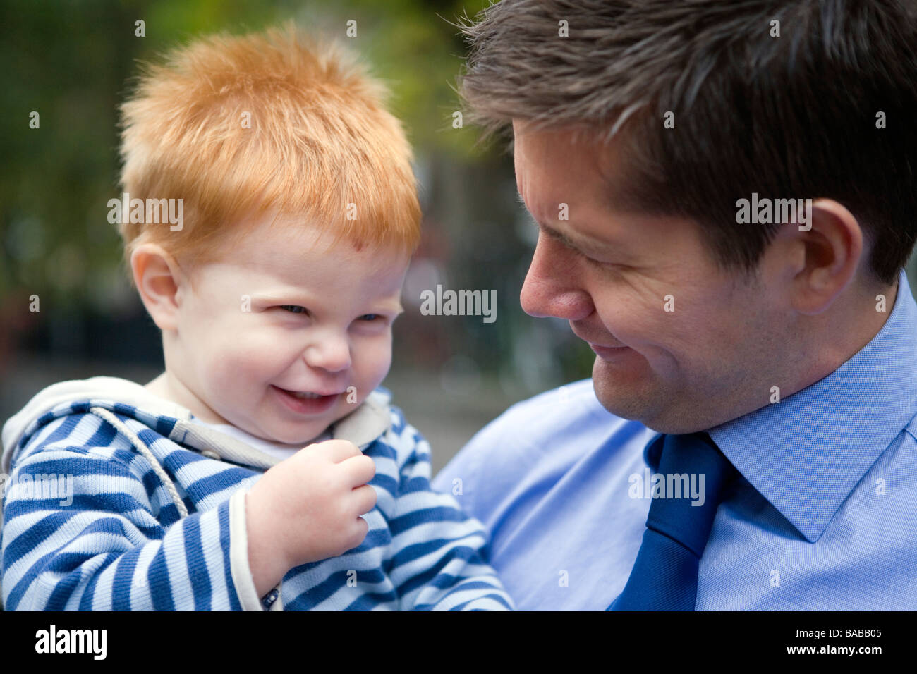 Smiling father with son Sweden Stock Photo - Alamy