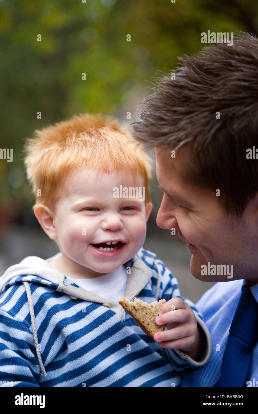 Smiling father with son Sweden Stock Photo - Alamy