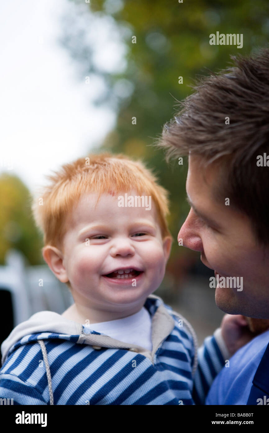 Smiling father with son Sweden Stock Photo - Alamy